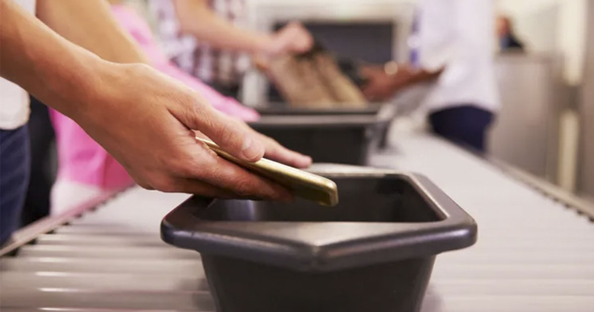 Why You Should Never Put Your Phone in the TSA Bin, According to Experts